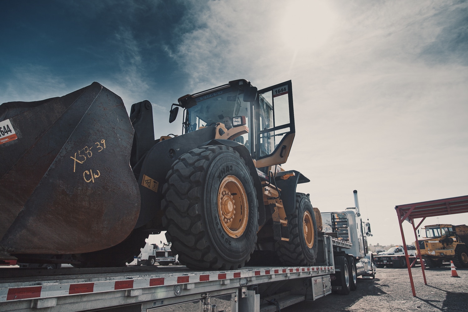 How To Transport Different Types Of Construction Loaders…